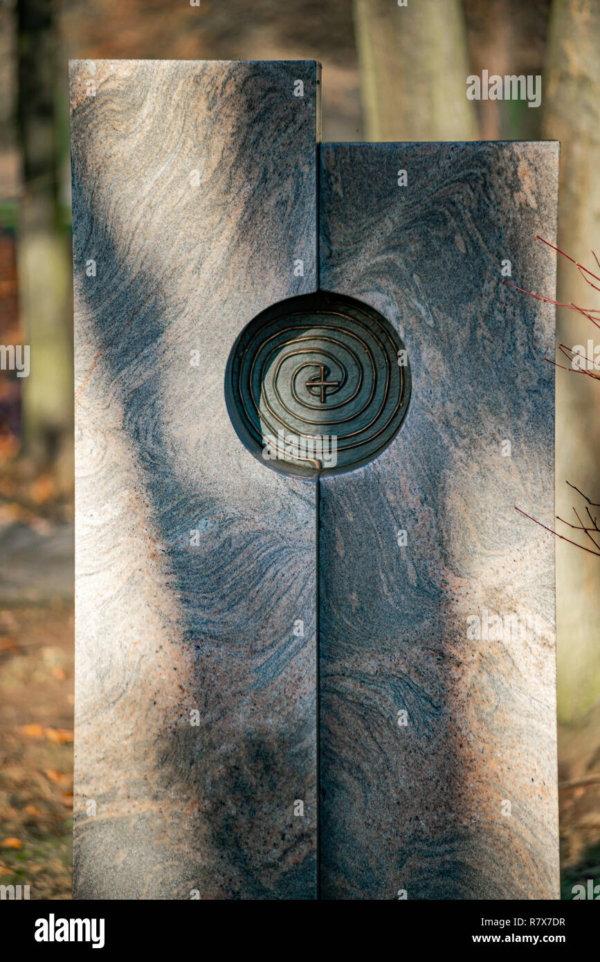 Modern tombstonewith a spiral on german cemetery in Berlin Tegel Stock ...