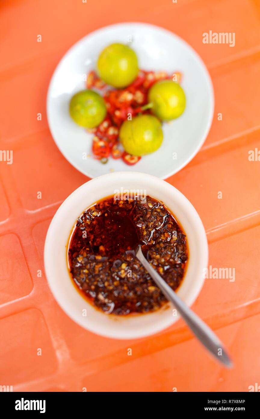 Vietnam, Hanoi, seasoning soups in a stall Stock Photo - Alamy