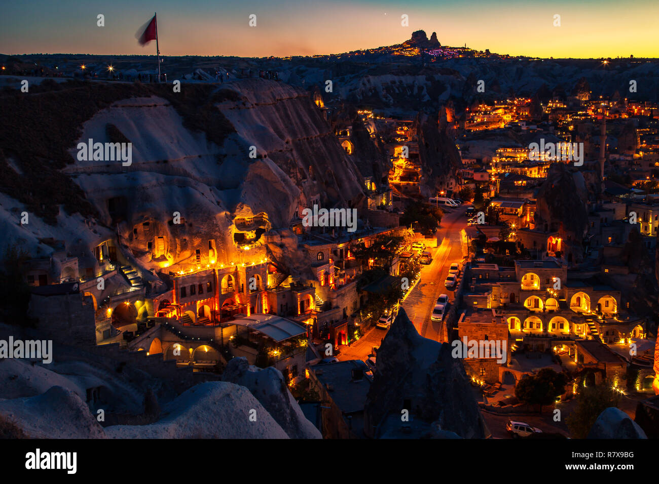 Illuminated at night streets of Goreme, Turkey, Cappadocia. The famous ...