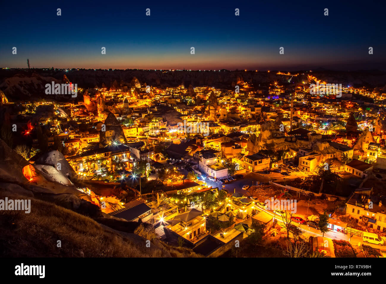 Illuminated at night streets of Goreme, Turkey, Cappadocia. The famous ...