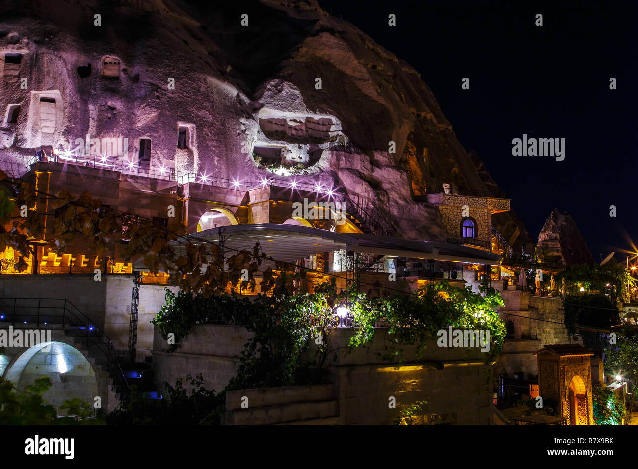 Illuminated at night streets of Goreme, Turkey, Cappadocia. The famous ...