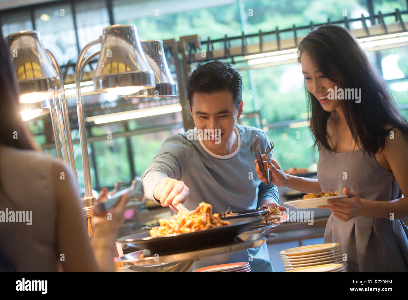 Young people the buffet Stock Photo - Alamy