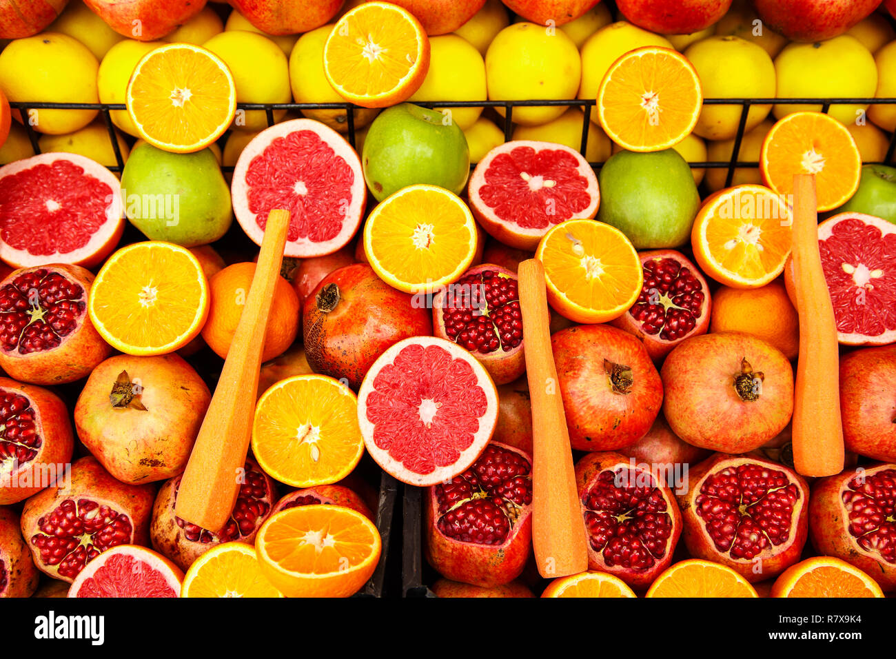 Ripe and juicy half fruit ready for making juice. Bright fruit ...