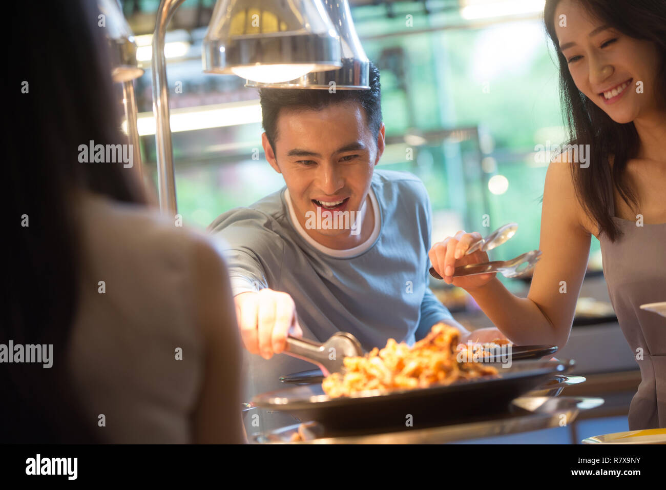 People at buffet hi-res stock photography and images - Alamy
