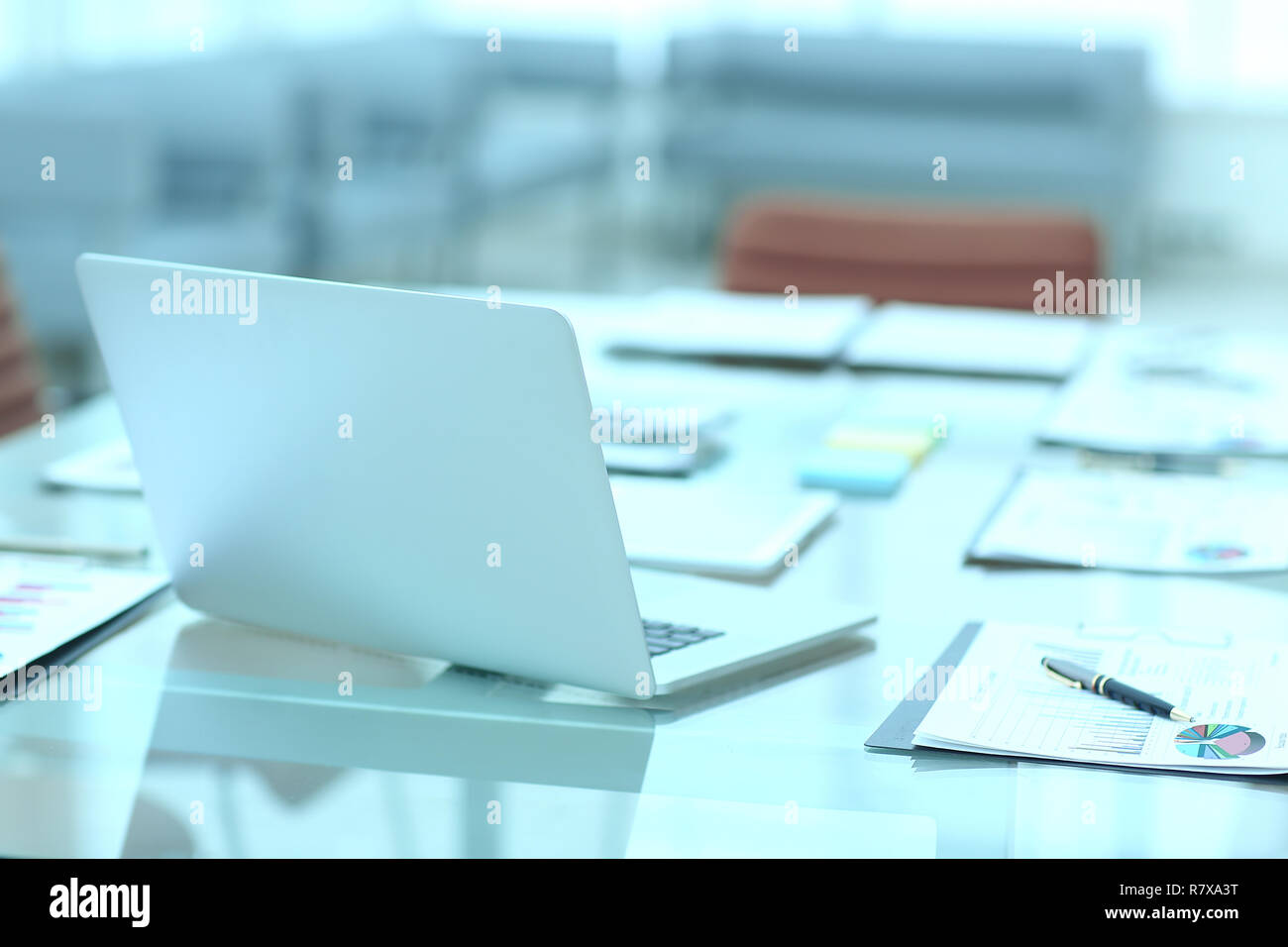 closeup.open laptop on the Desk of a businessman Stock Photo - Alamy