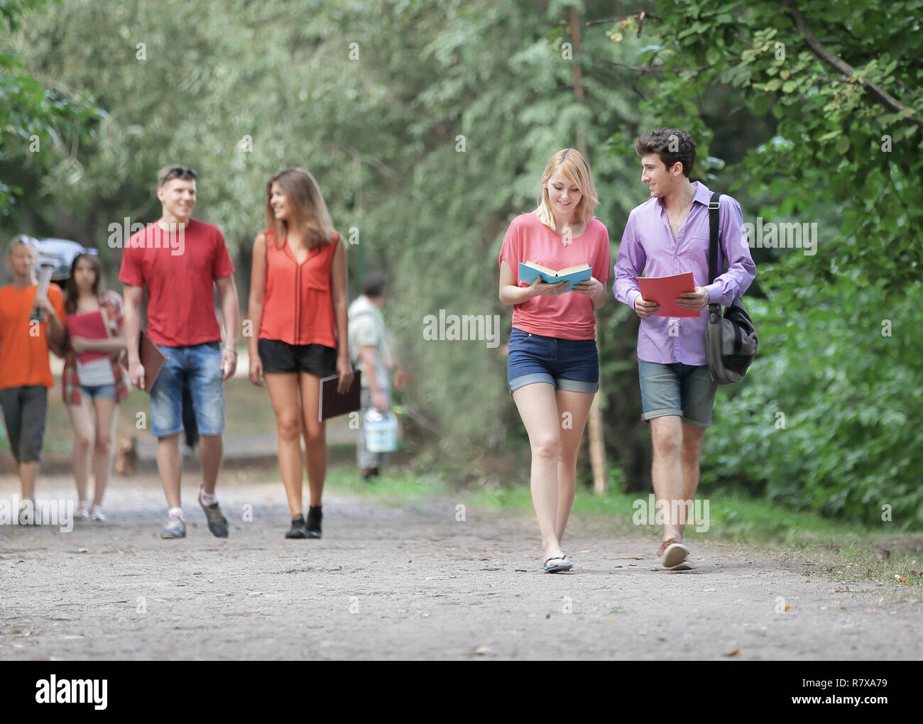 group of College students walking together in the Park Stock Photo - Alamy group of College students walking together in the Park Stock Photo - Alamy