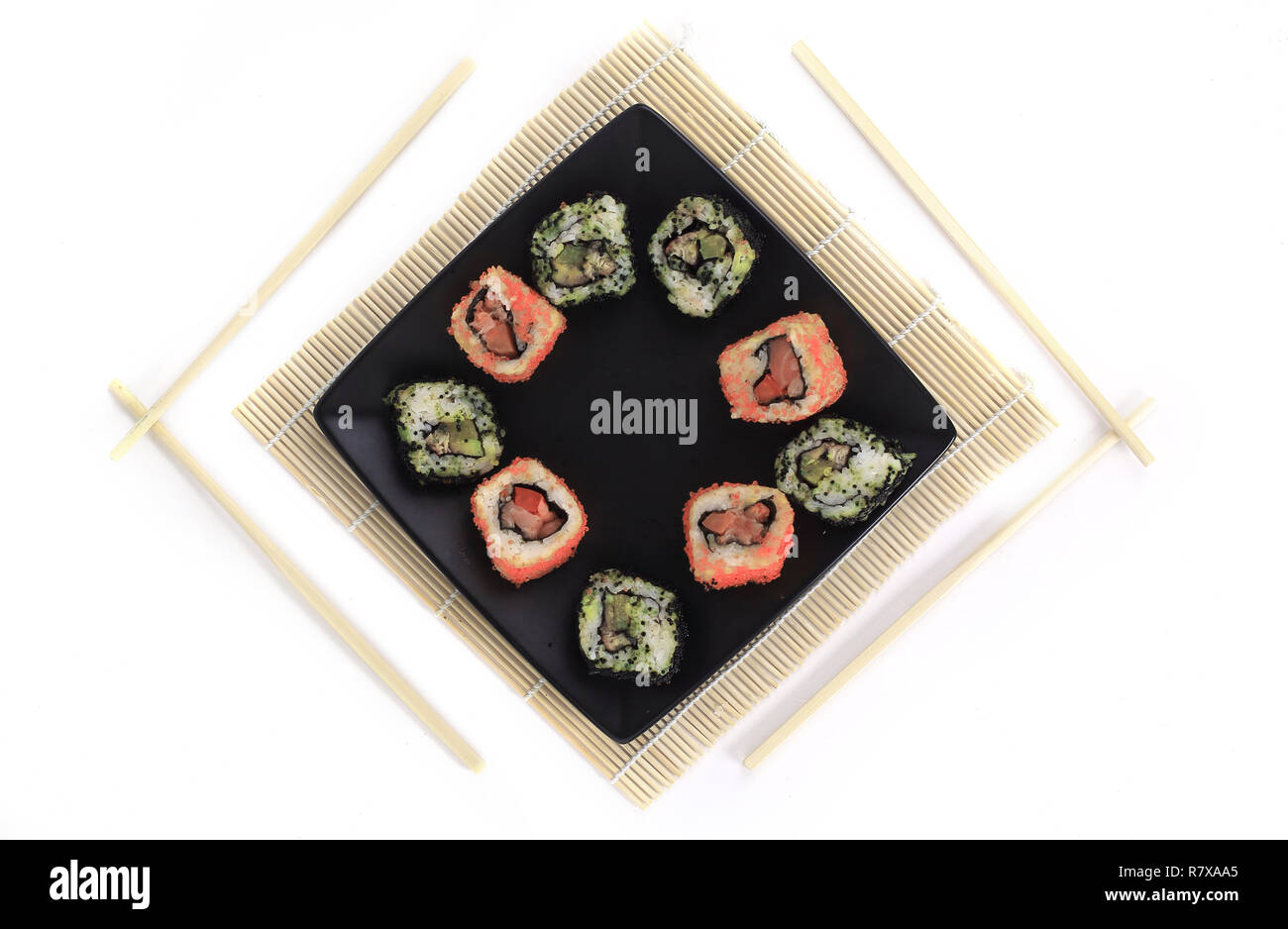 different types of Maki sushi on a black plate Stock Photo - Alamy