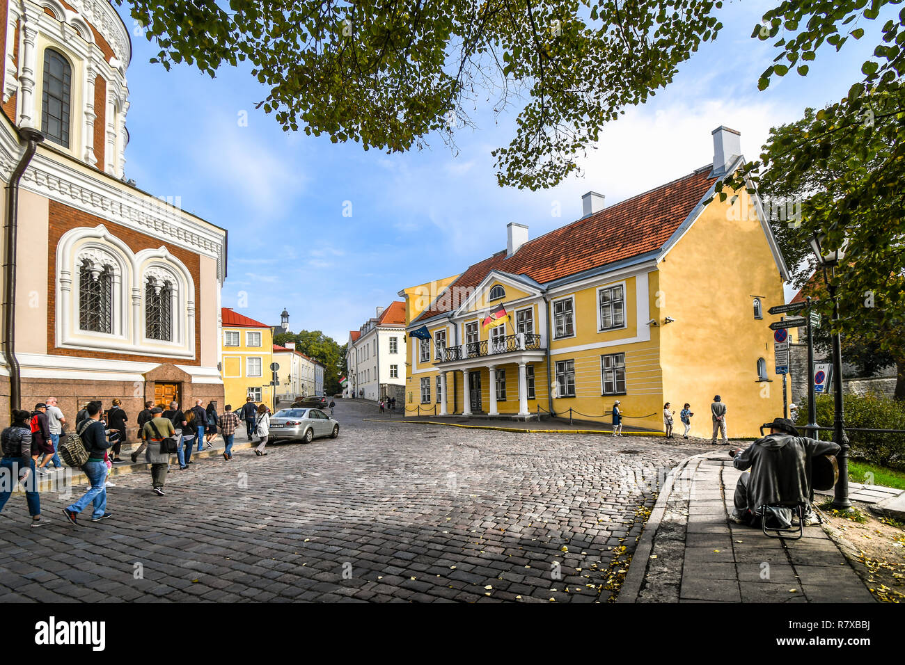 Tourists walk cobbled streets past the Alexander Nevsky Cathedral the ...