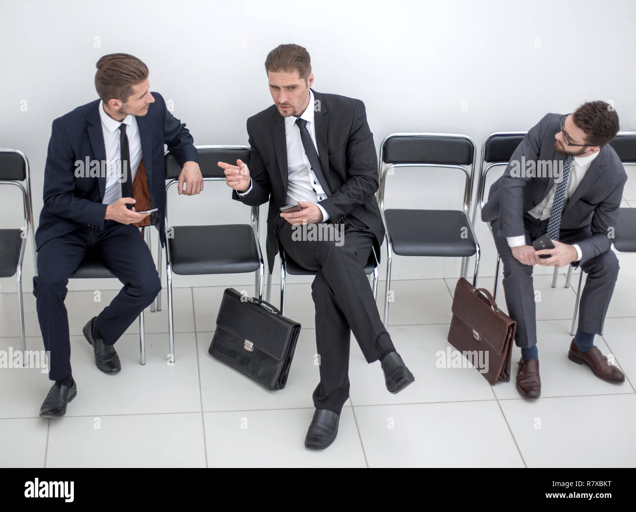 top view.employees sitting in the office hallway Stock Photo - Alamy
