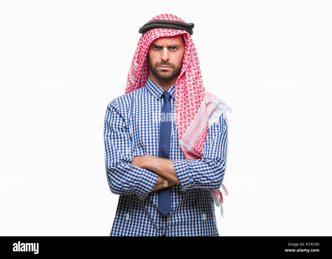 Young handsome arabian business man wearing keffiyeh over isolated ...