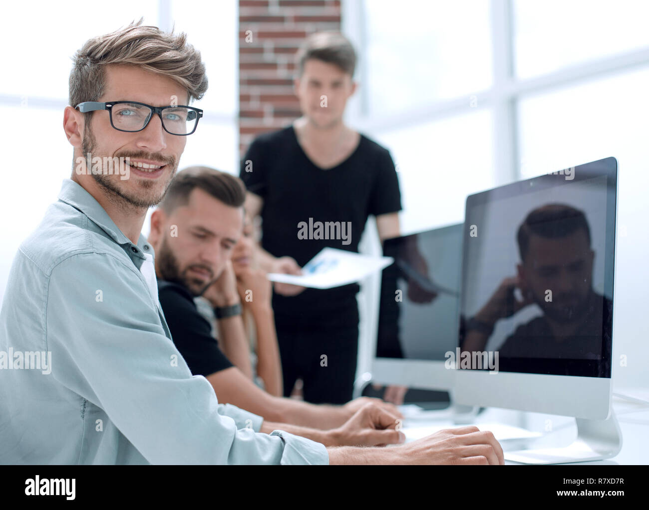 Multiethnic group of happy business people working together Stock Photo ...