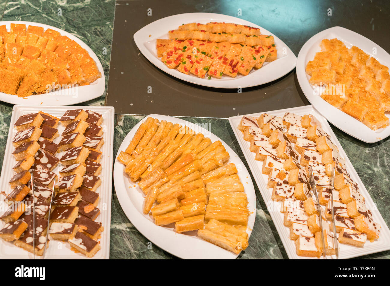 Various desserts in the restaurant. Composition of pastry desserts of ...
