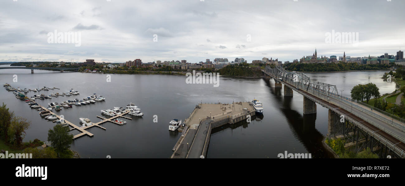 Aerial panoramic view of Alexandra Bridge going over Ottawa River from ...