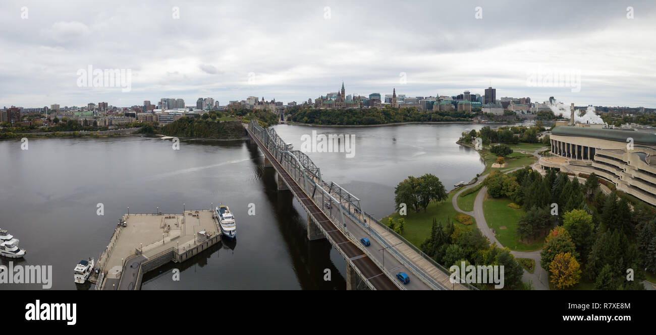 Aerial panoramic view of Alexandra Bridge going over Ottawa River from ...