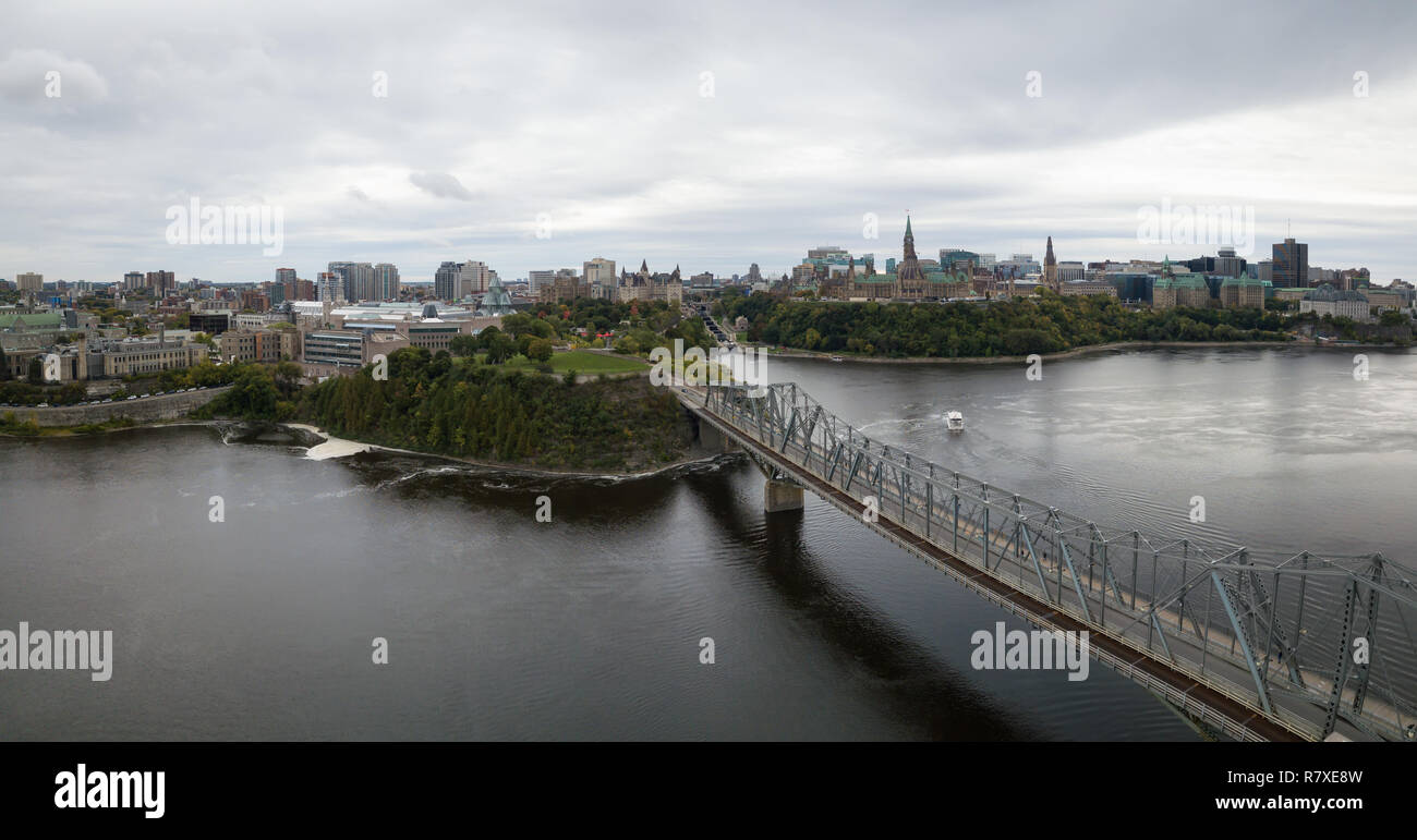 Aerial panoramic view of Alexandra Bridge going over Ottawa River from ...
