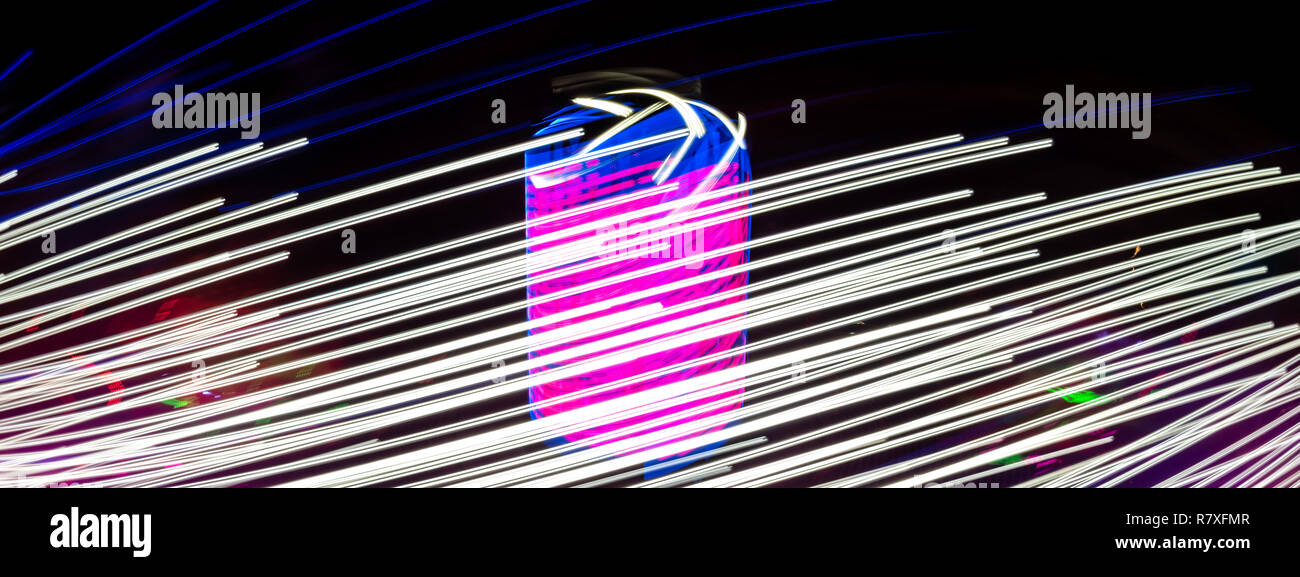 Long Exposure Of A Spinning Carnival Ride Stock Photo - Alamy