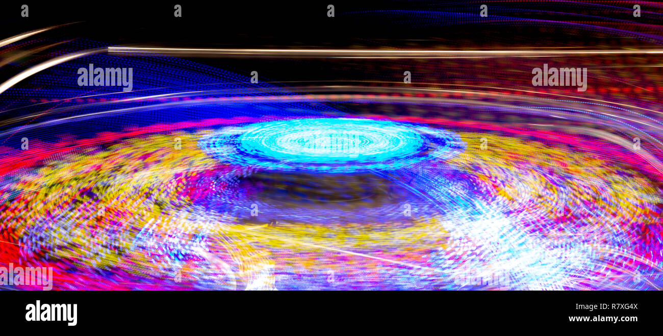 Long Exposure Of A Spinning Carnival Ride Stock Photo - Alamy