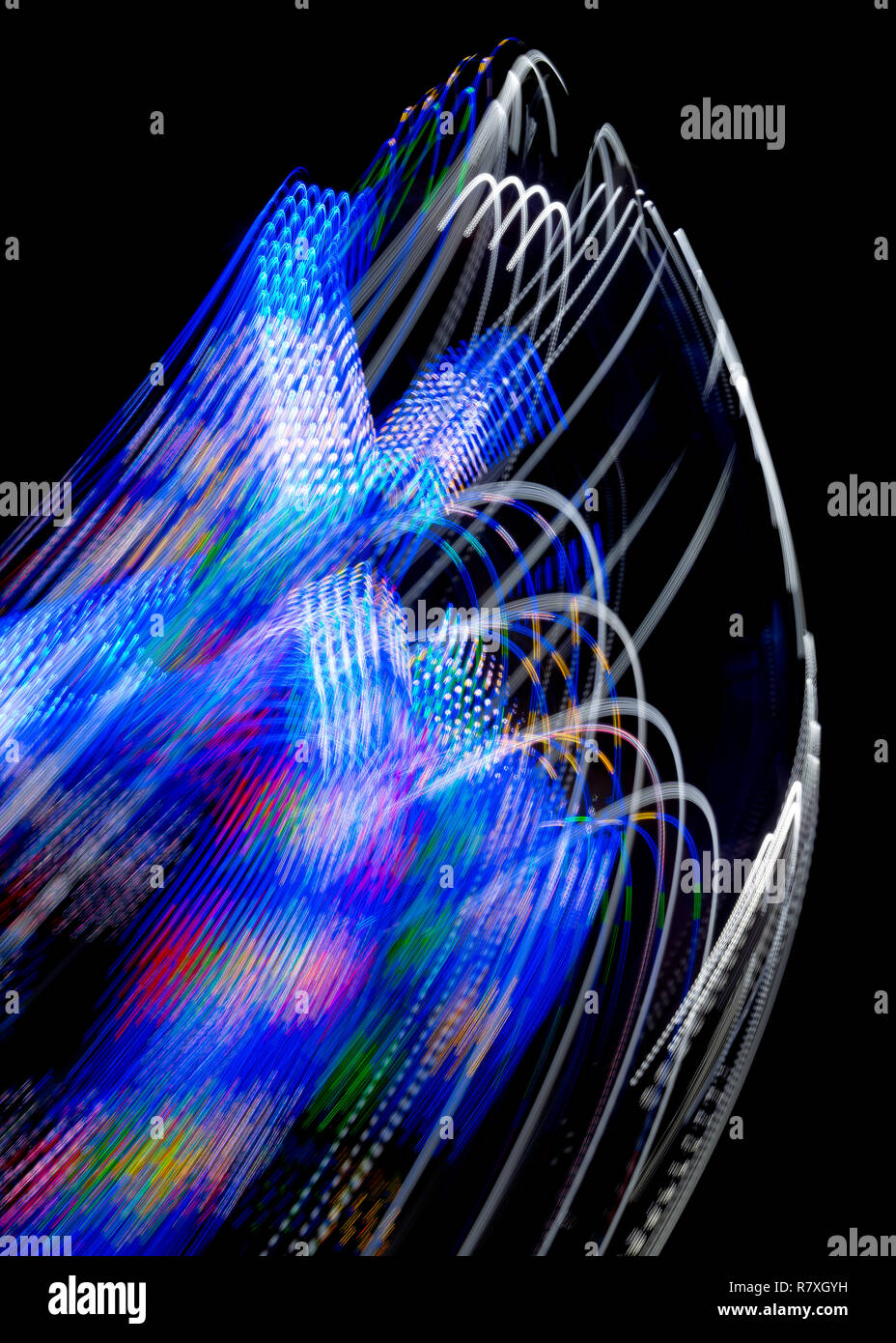 Long Exposure Of A Spinning Carnival Ride Stock Photo - Alamy
