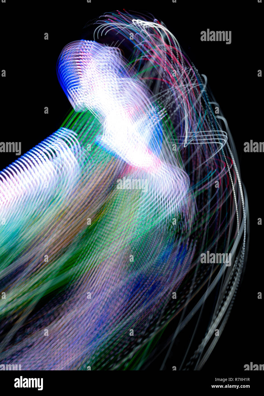 Long Exposure Of A Spinning Carnival Ride Stock Photo - Alamy