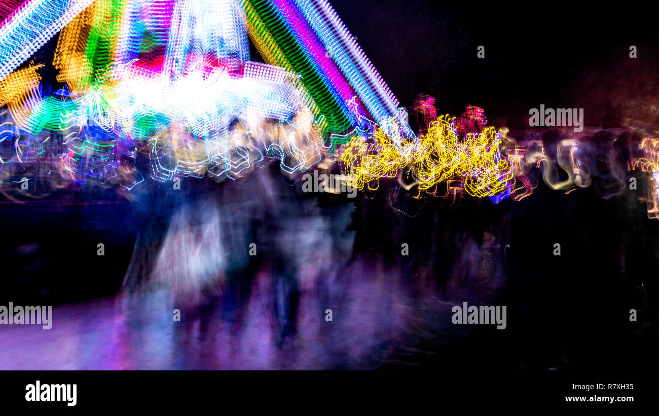 Long Exposure People Of People In Fairground Stock Photo - Alamy