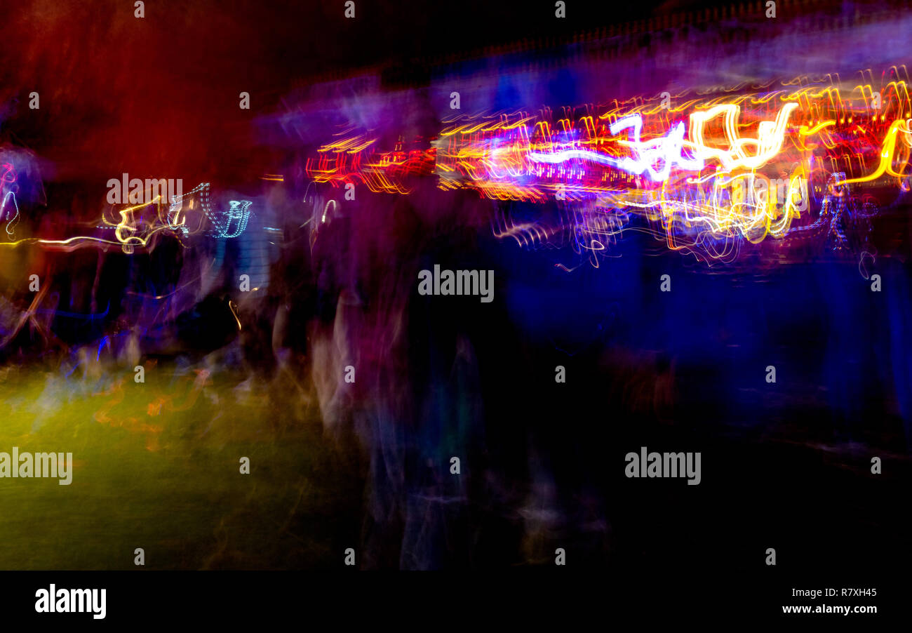 Long Exposure People Of People In Fairground Stock Photo - Alamy