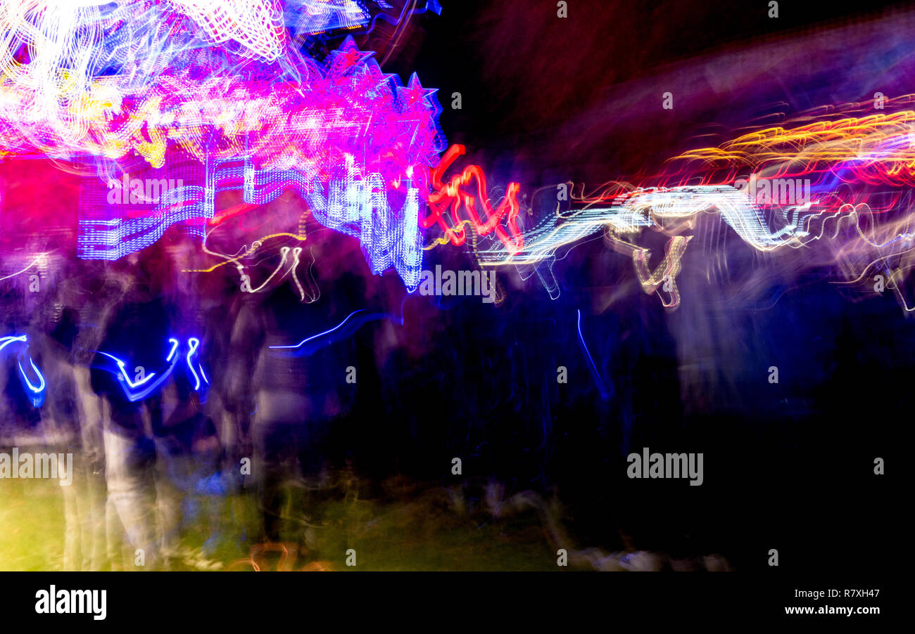 Long Exposure People Of People In Fairground Stock Photo - Alamy