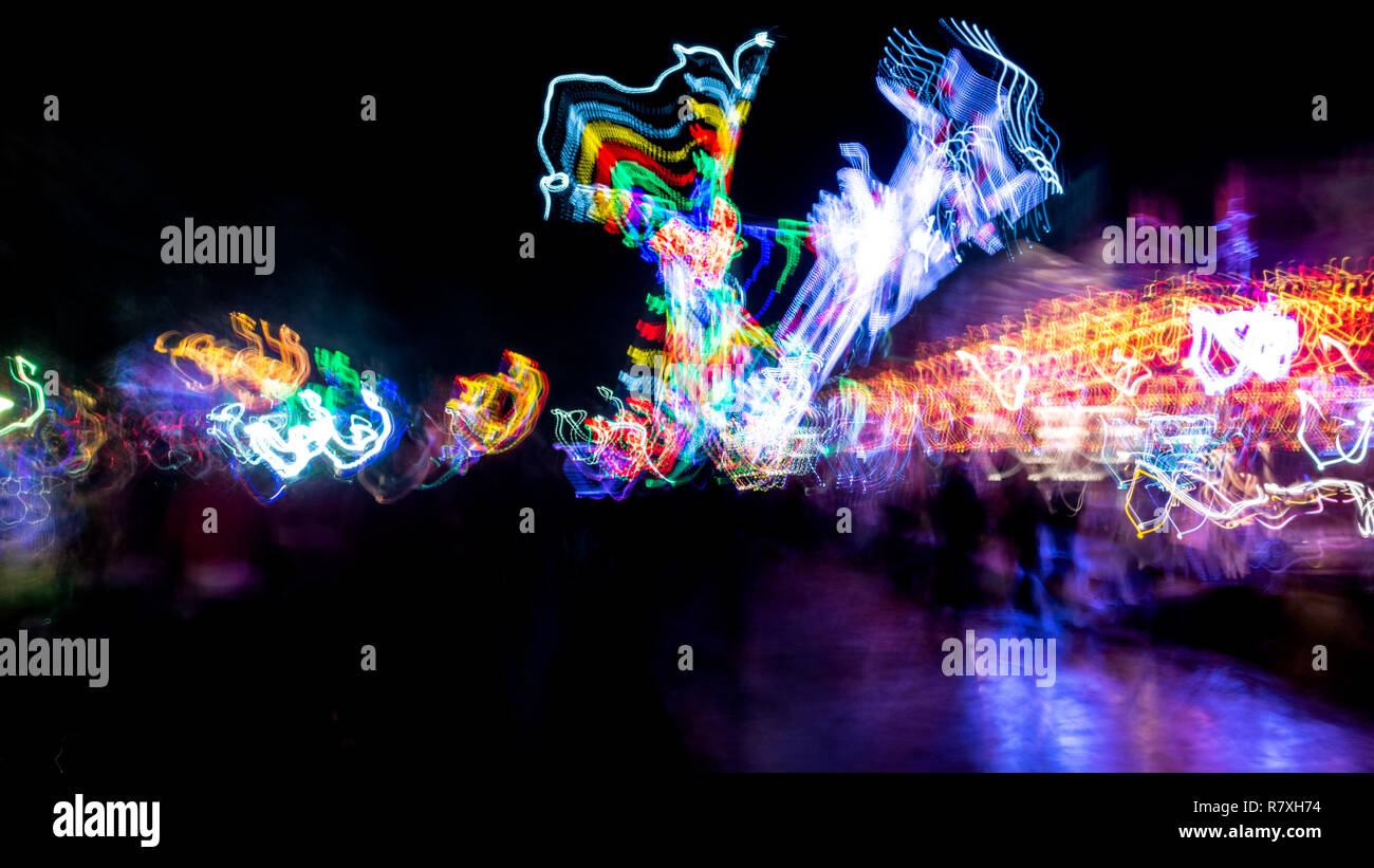 Long Exposure People Of People In Fairground Stock Photo - Alamy