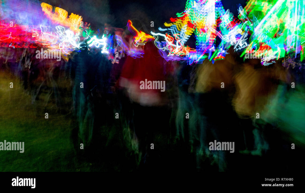 Long Exposure People Of People In Fairground Stock Photo - Alamy