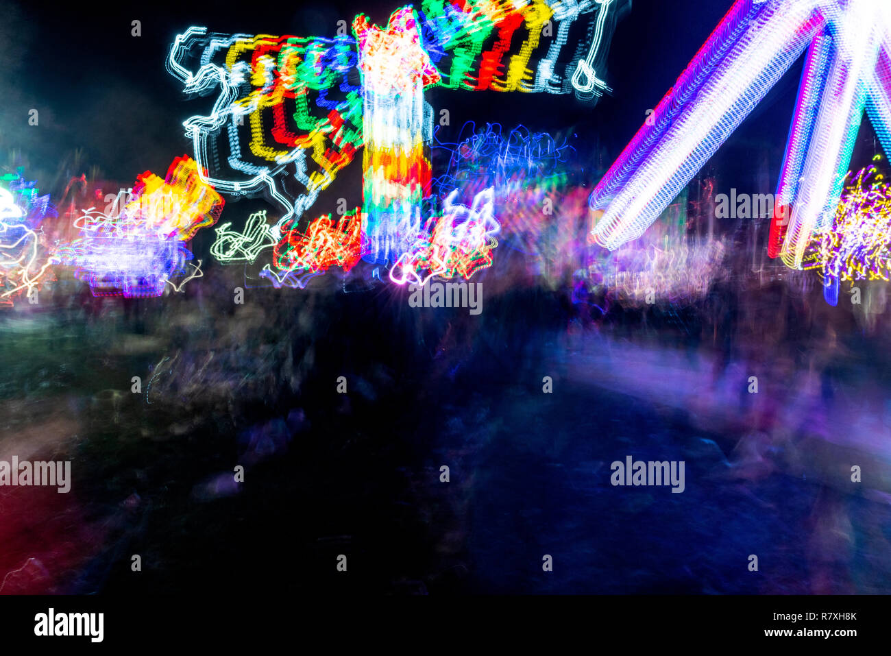 Long Exposure People Of People In Fairground Stock Photo - Alamy