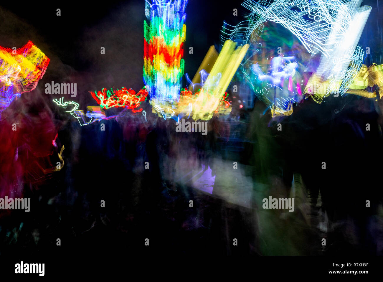 Long Exposure People Of People In Fairground Stock Photo - Alamy