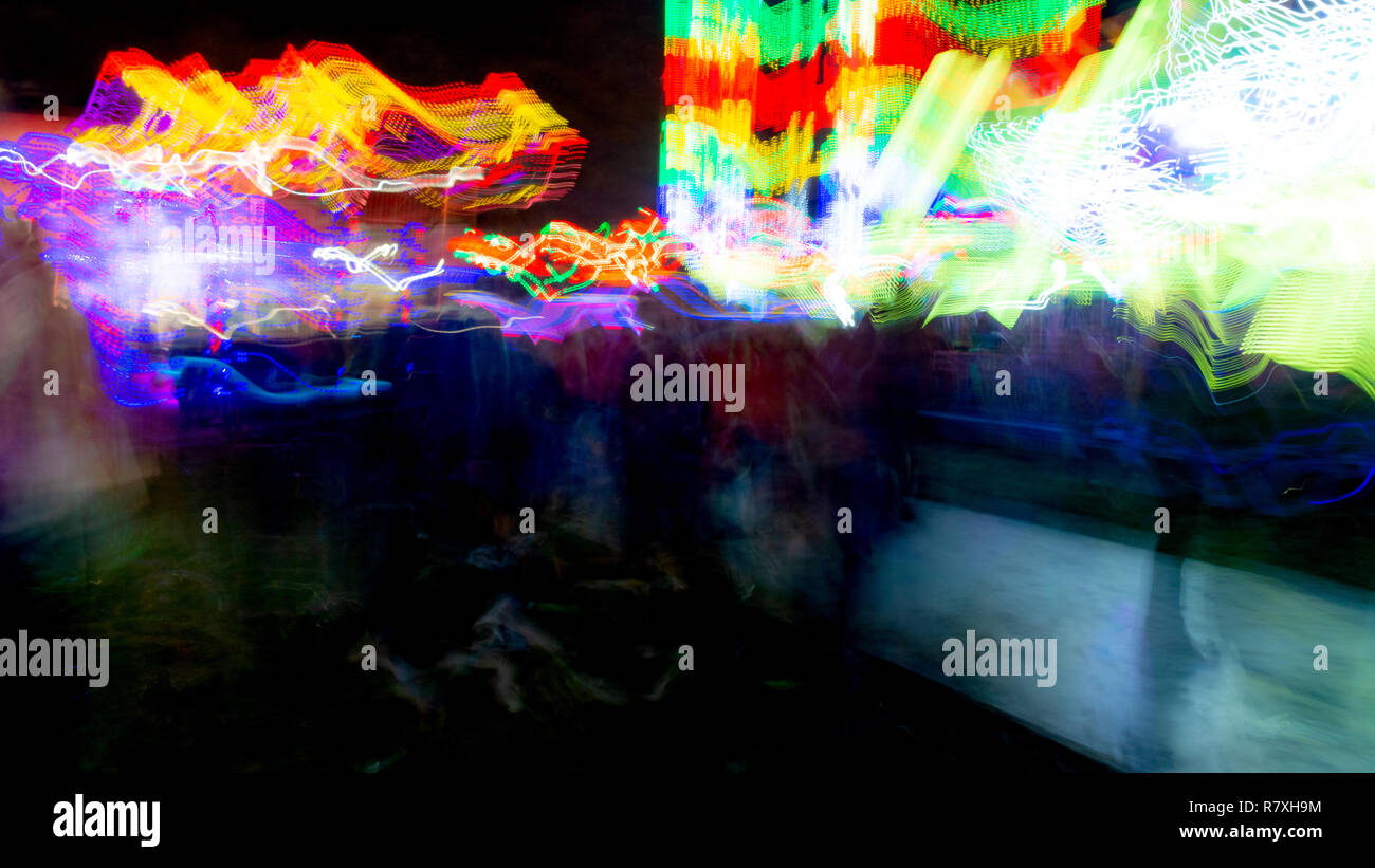 Long Exposure People Of People In Fairground Stock Photo - Alamy