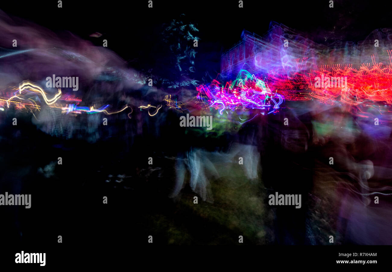 Long Exposure People Of People In Fairground Stock Photo - Alamy