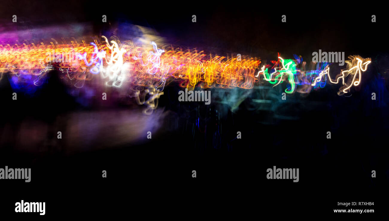 Long Exposure People Of People In Fairground Stock Photo - Alamy