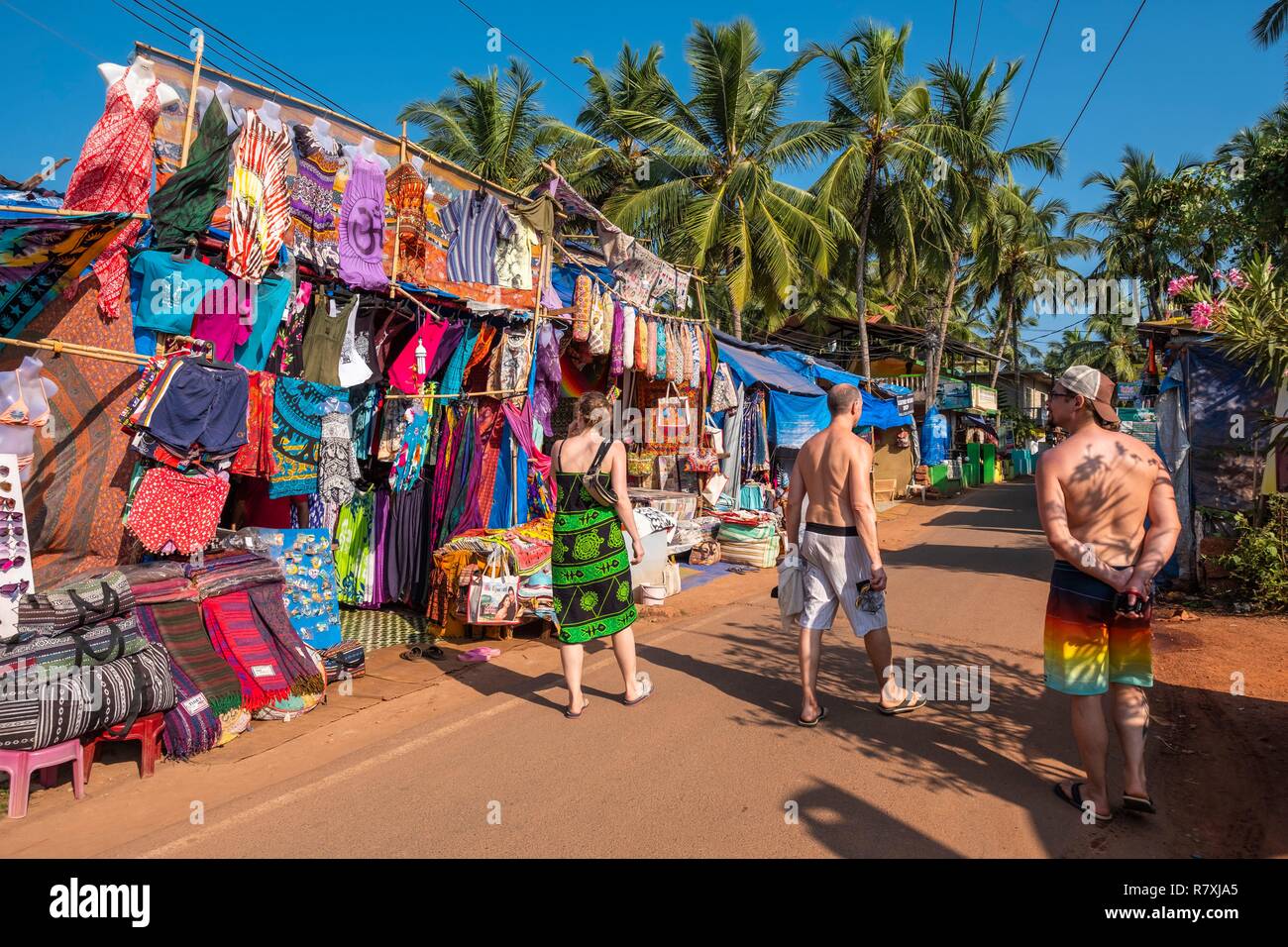 India, Goa, Agonda, clothes and fabric shop in the main shopping street ...