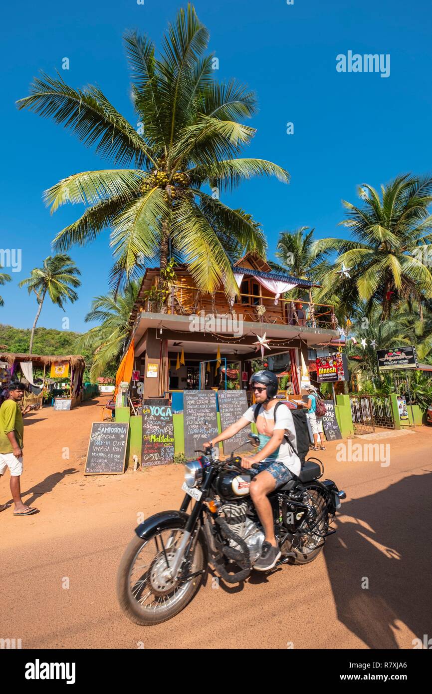 India, Goa, Agonda, tourist driving a Royal Enfield Stock Photo - Alamy