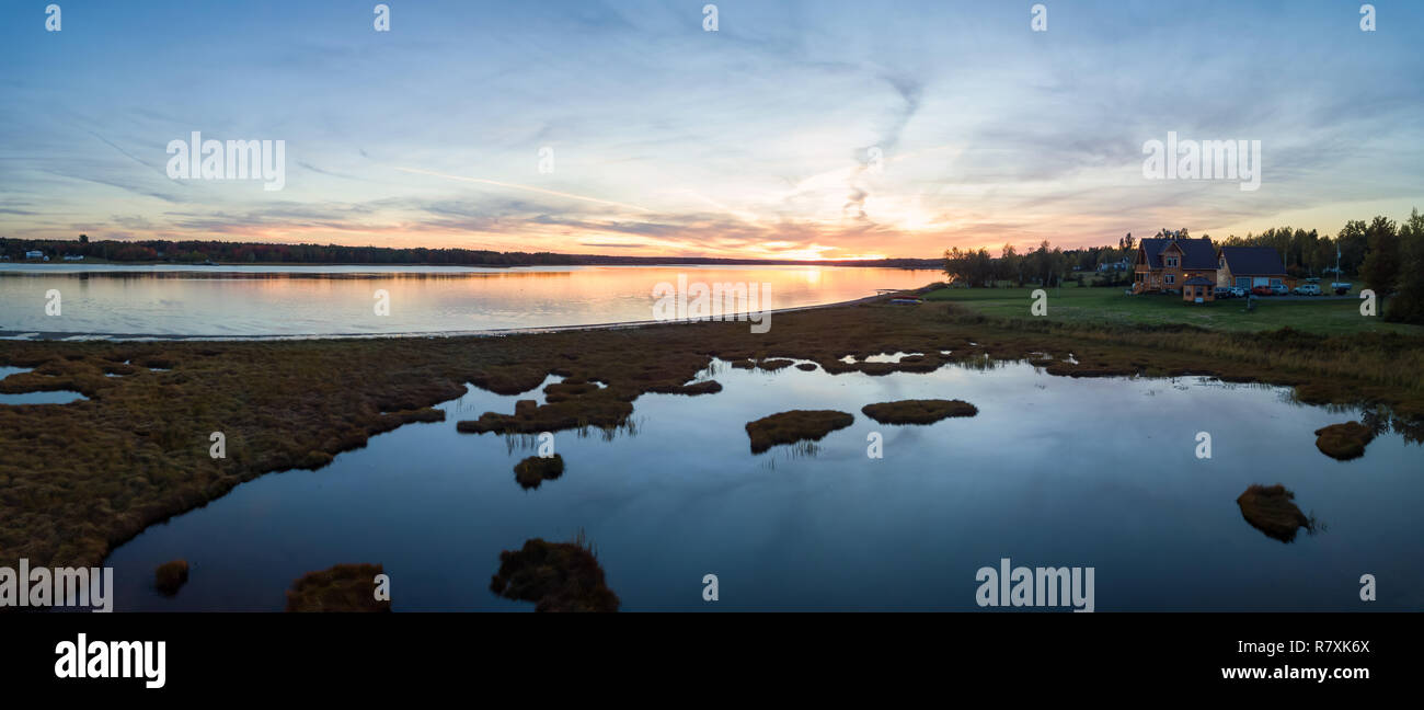 Aerial panoramic view of a beautiful sunset by the Cocagne River. Taken ...