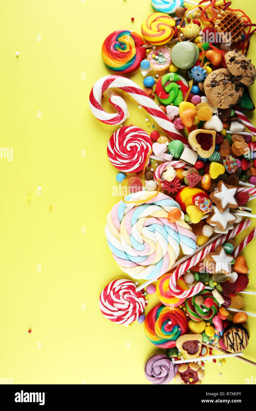 candies with jelly and sugar. colorful array of different childs sweets ...