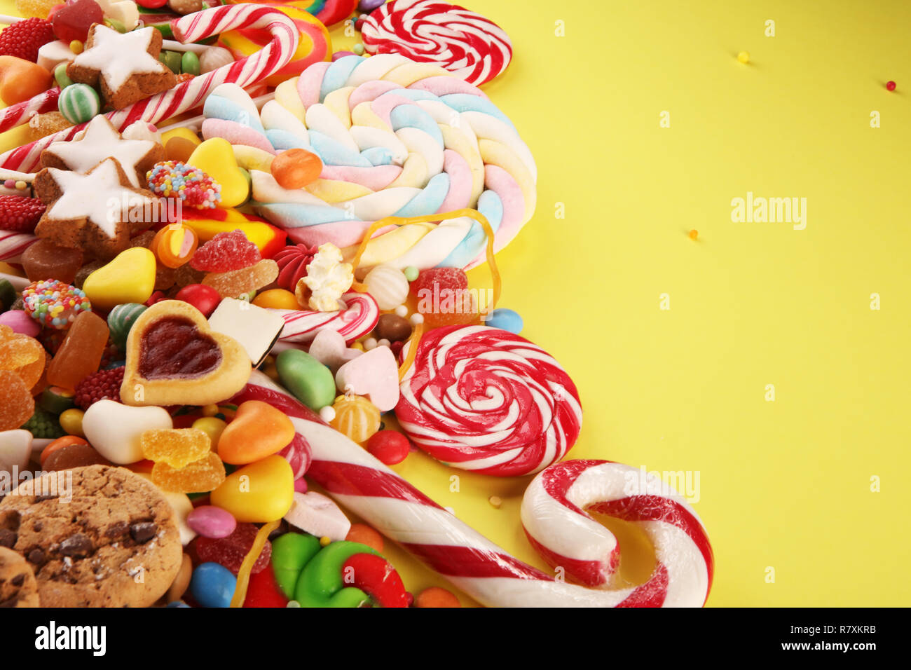 candies with jelly and sugar. colorful array of different childs sweets ...