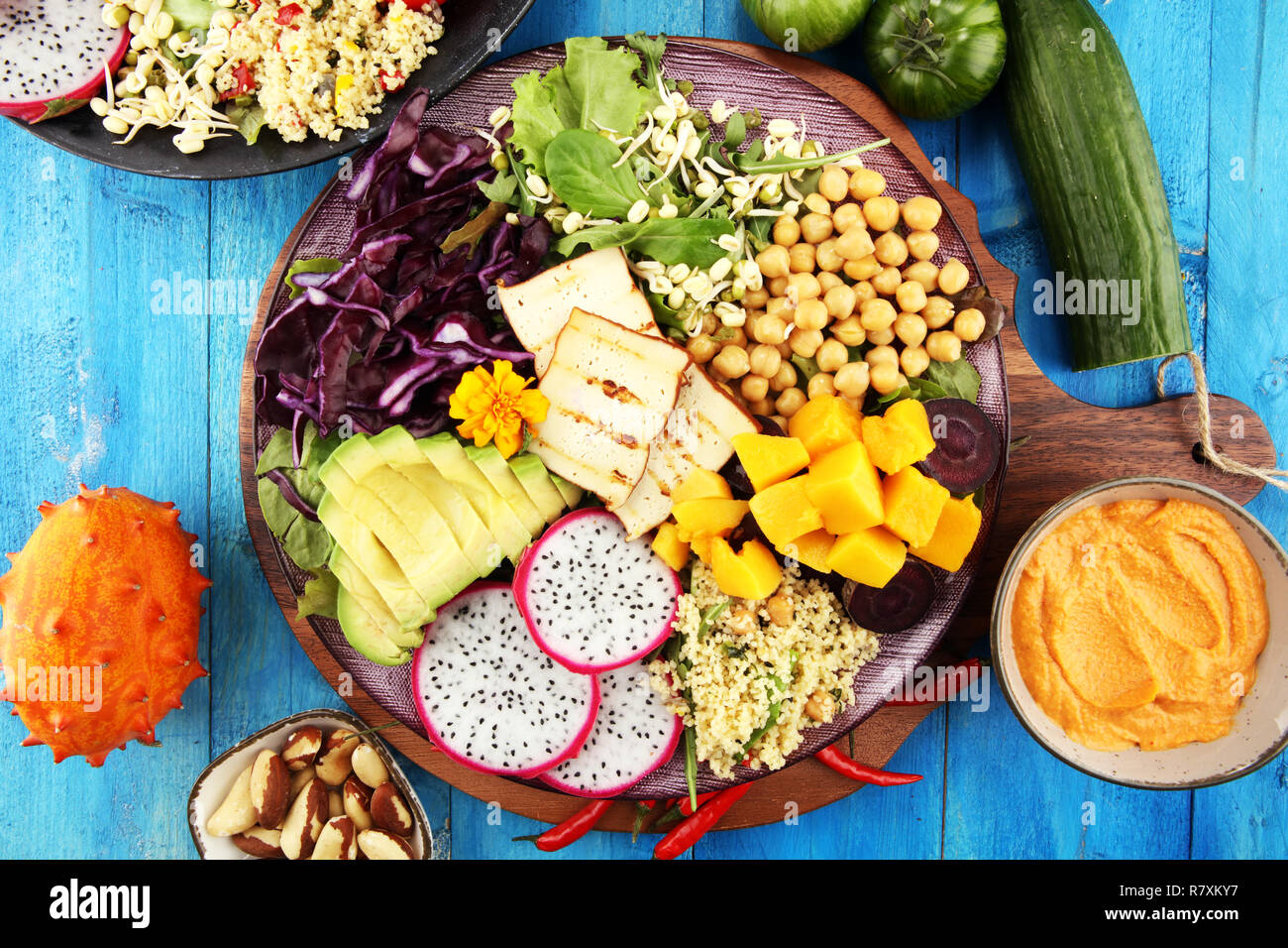 grilled tofu and dragon fruit buddha bowl with vegetable and humus ...