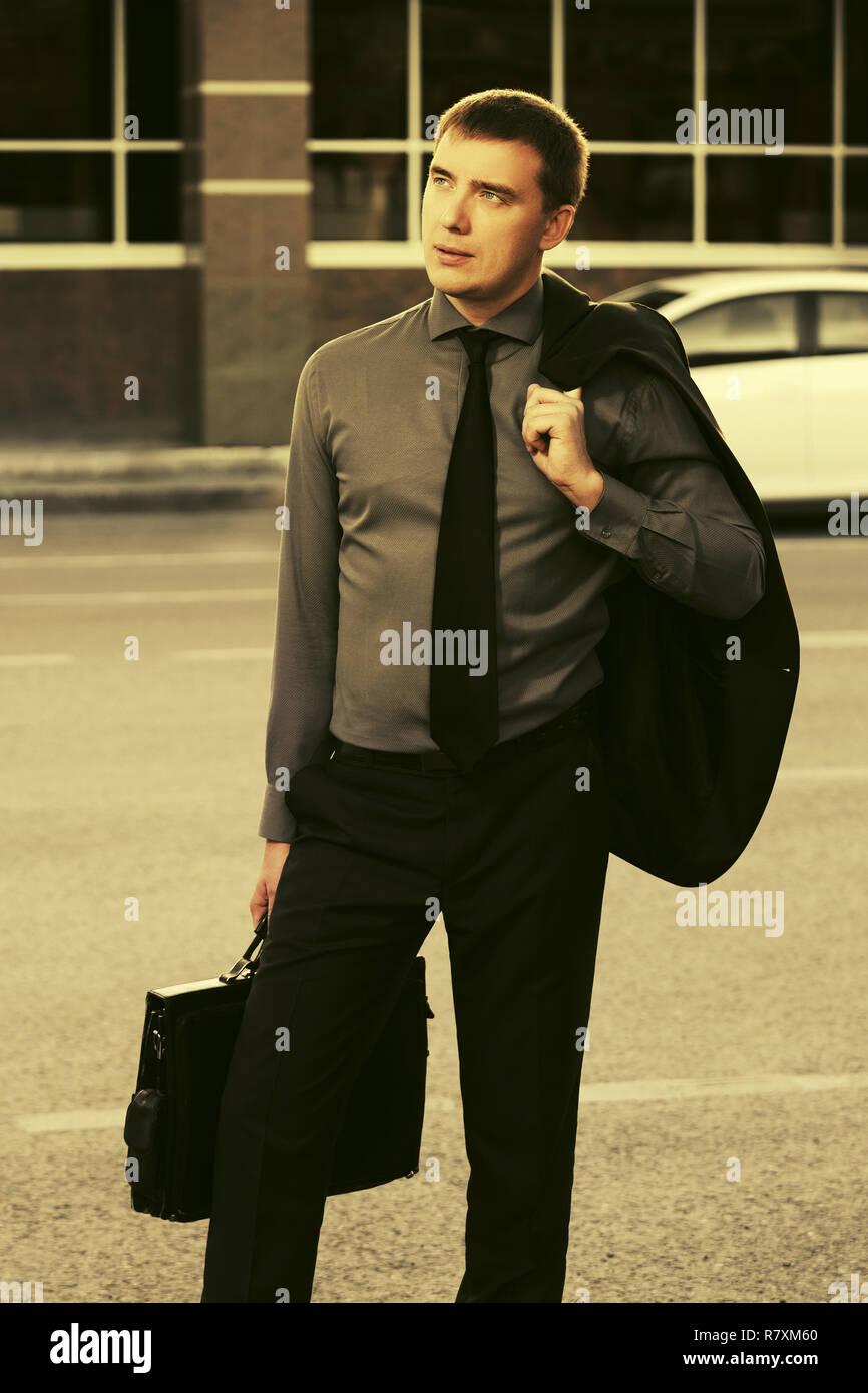 Man walking away suit hi-res stock photography and images - Alamy