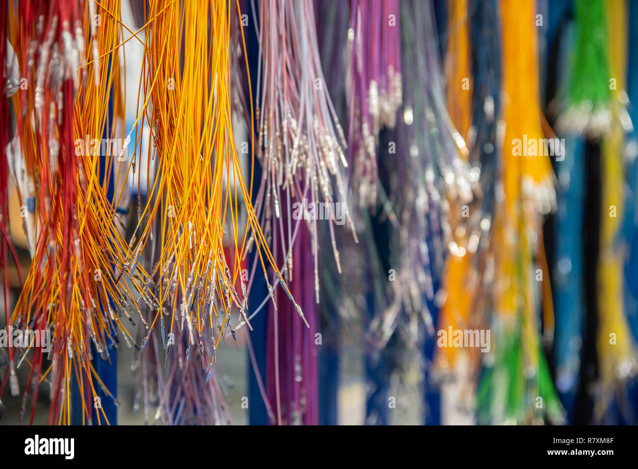 Bunch of sliced wires with pins, manufacturing Stock Photo - Alamy