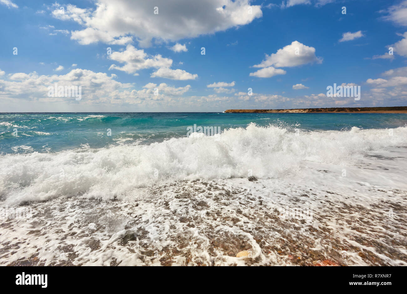 Beautiful wild beach with clear turquoise water and waves. Lara beach ...