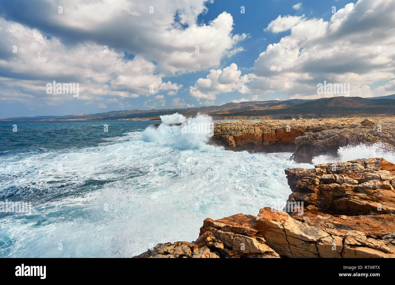 Waves beat on the rocky shore, Mediterranean Sea. Cyprus Stock Photo ...