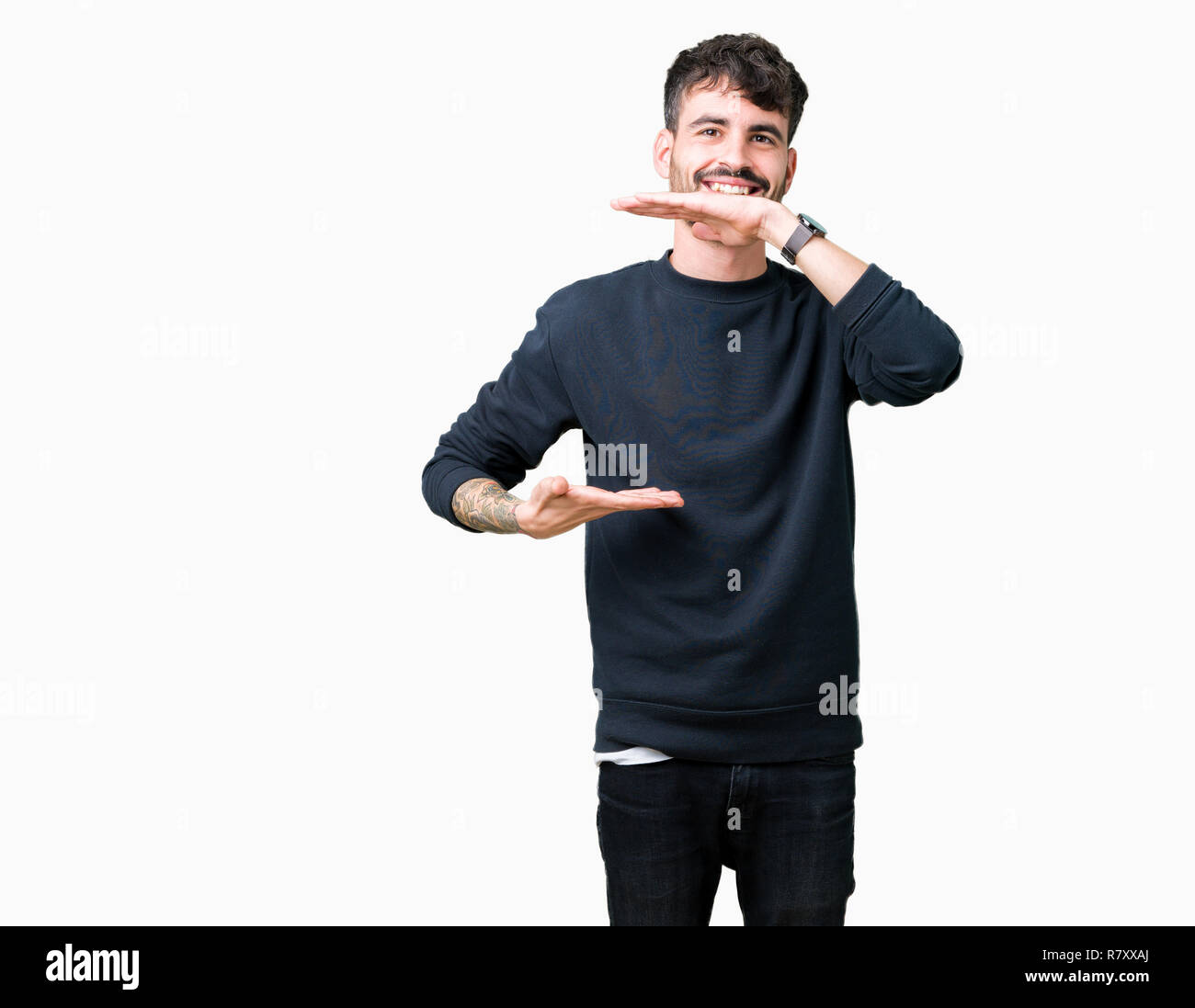 Young handsome man over isolated background gesturing with hands ...