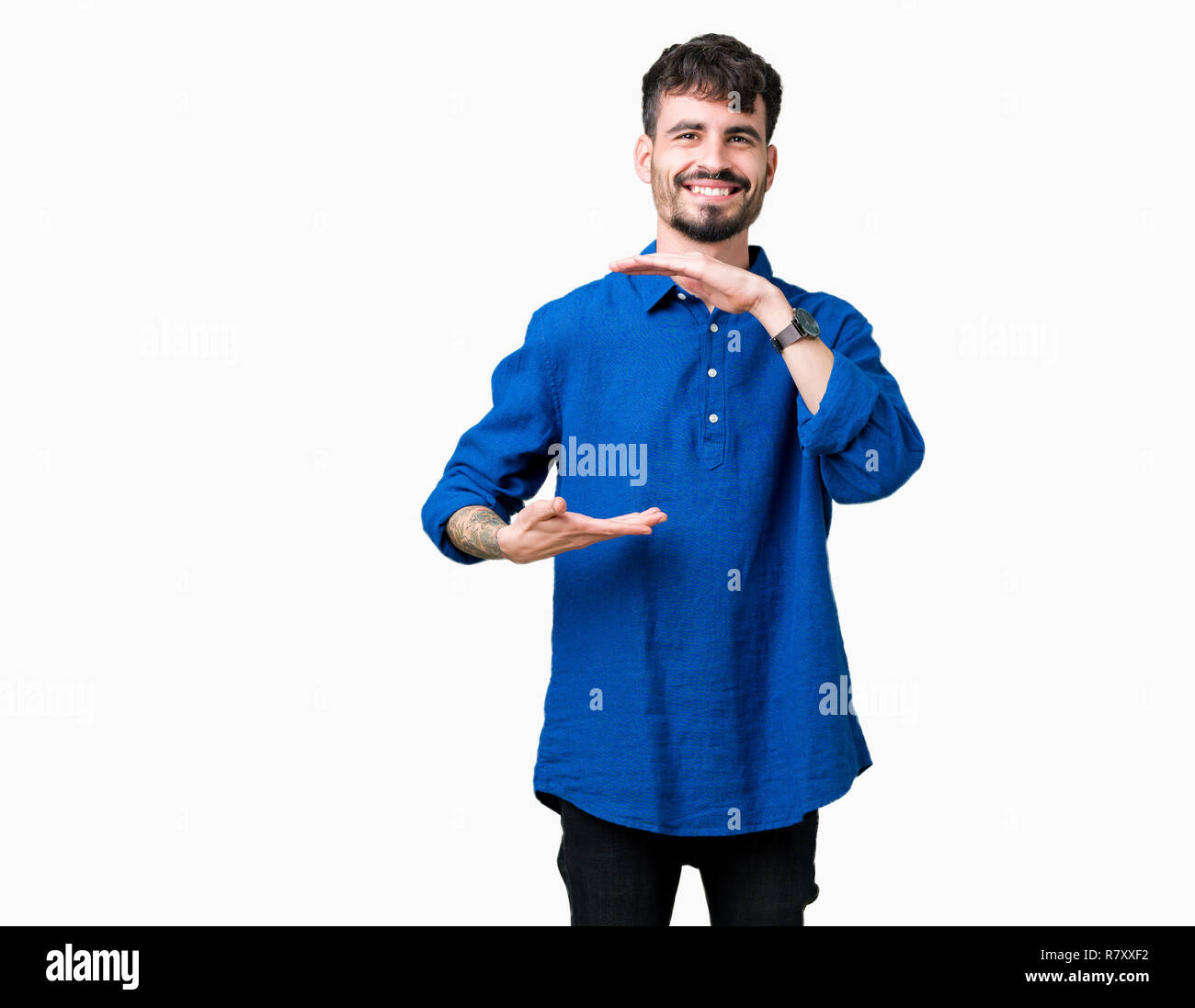 Young handsome man over isolated background gesturing with hands ...