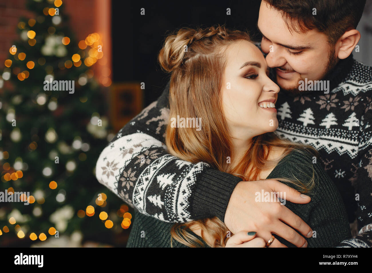 Home happy family couple christmas tree hi-res stock photography and ...
