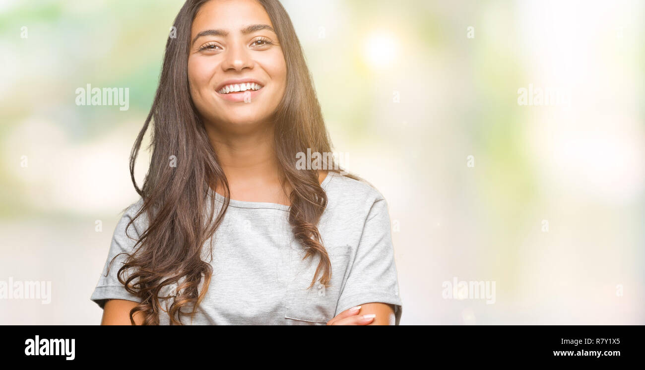 Young beautiful arab woman over isolated background happy face smiling ...