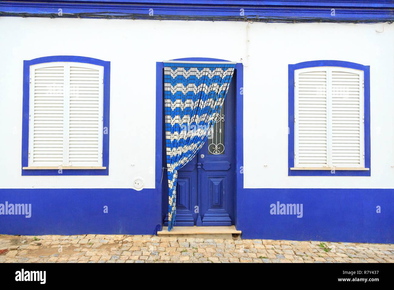 Portugal, Algarve, Tavira, blue and white front of a house Stock Photo ...
