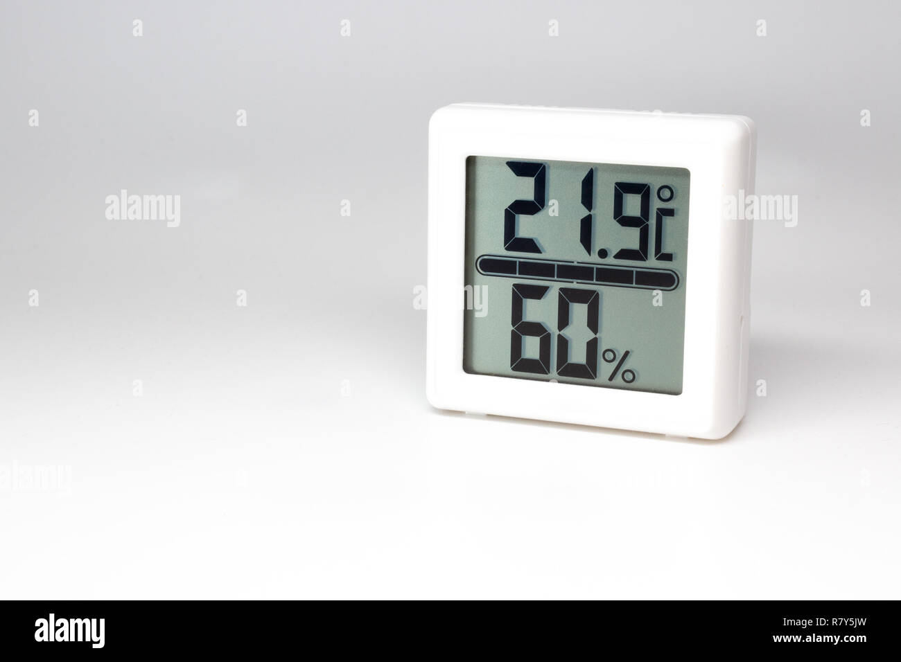 Digital device measuring temperature and humidity. Thermometer and ...