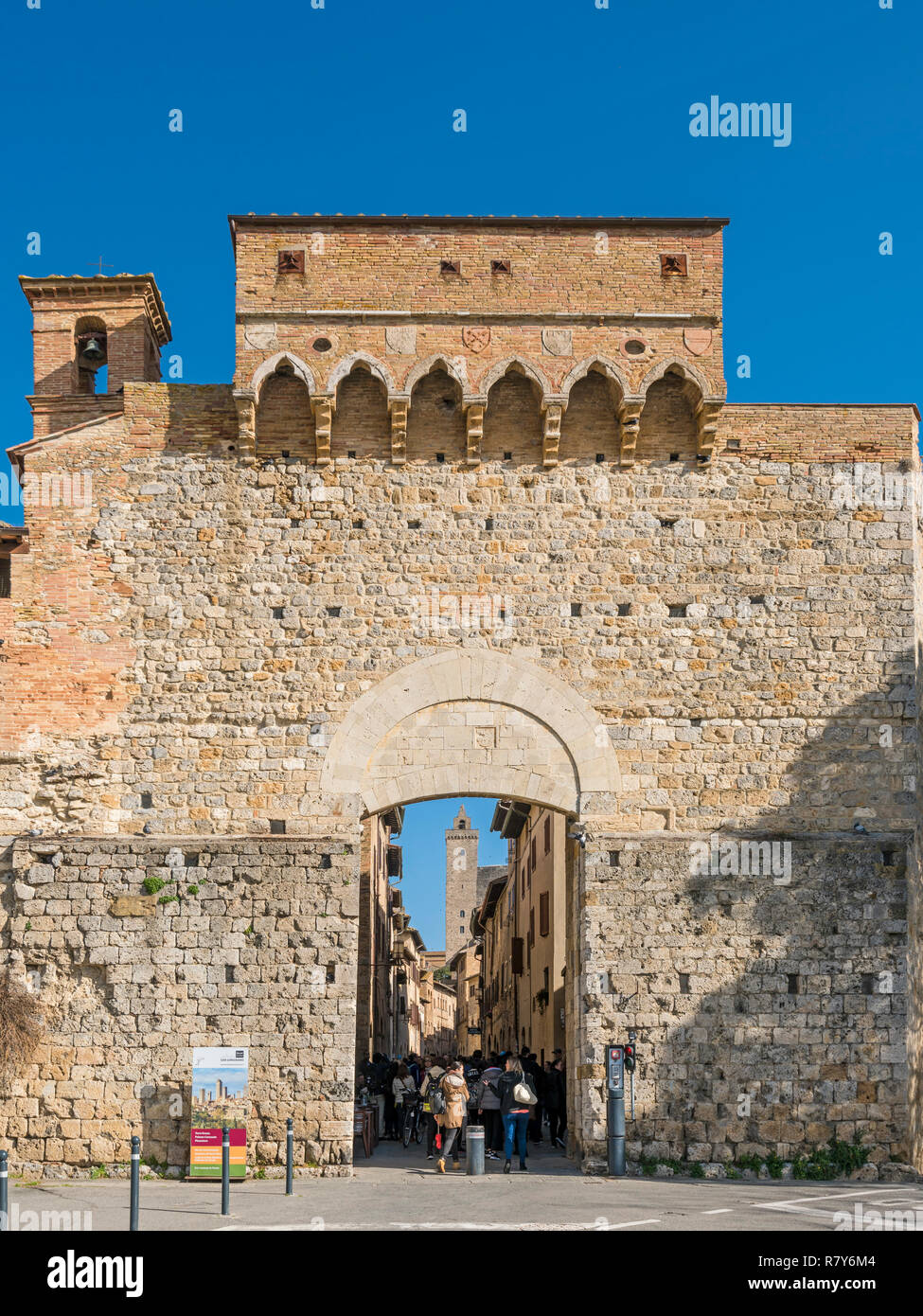 Vertical view of the main gateway into San Gimignano, Italy Stock Photo ...